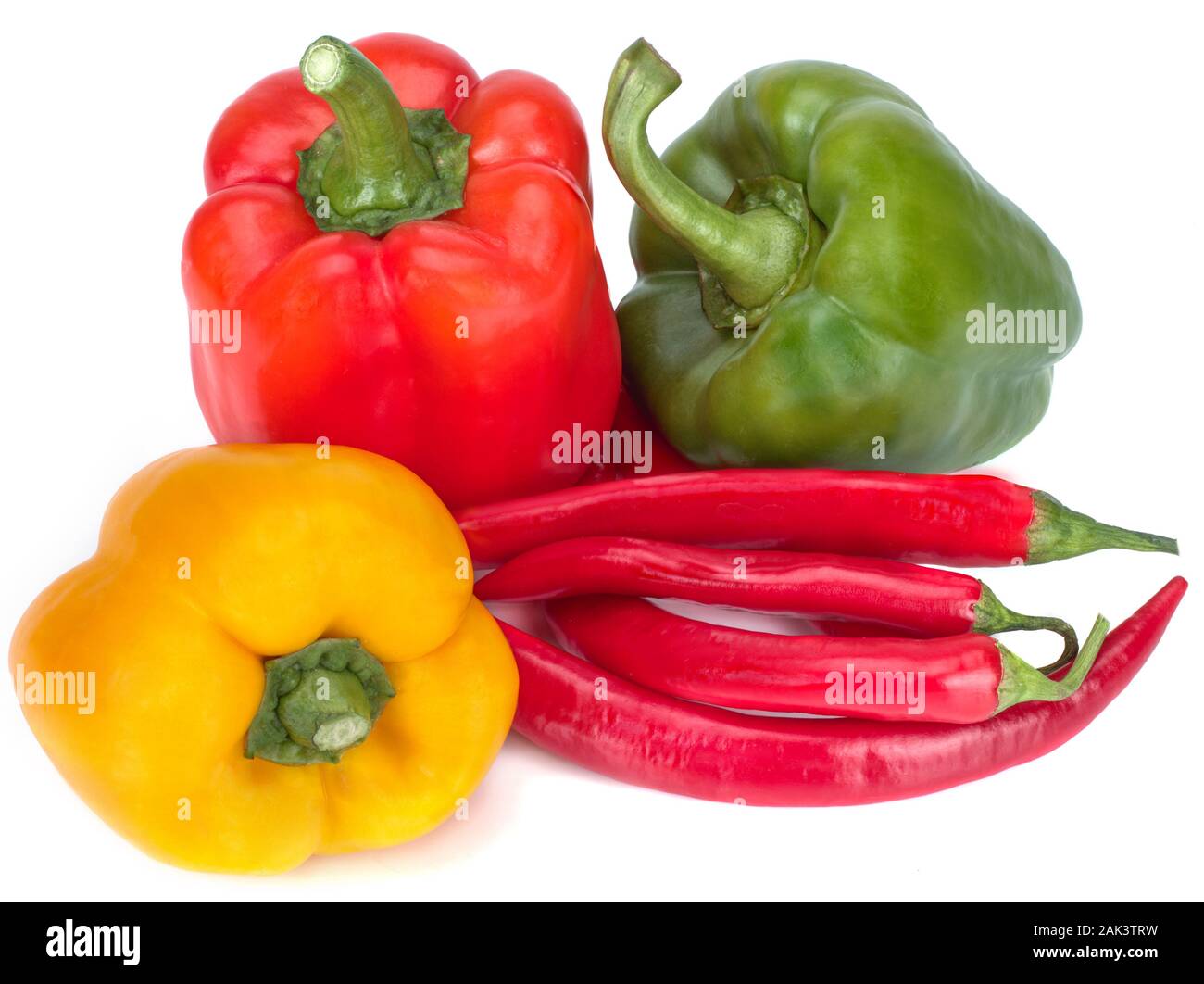 Assorted peppers isolated on a white background Stock Photo - Alamy