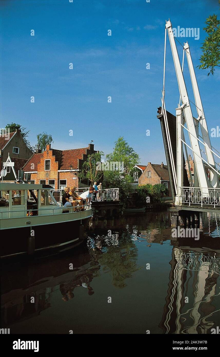 Picturesque view of a canal and a drawbridge in Edam. Edam has a ...