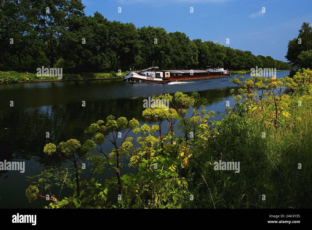 A barge on the Dortmund-Ems channel near Lingen in the Emsland, Germany ...