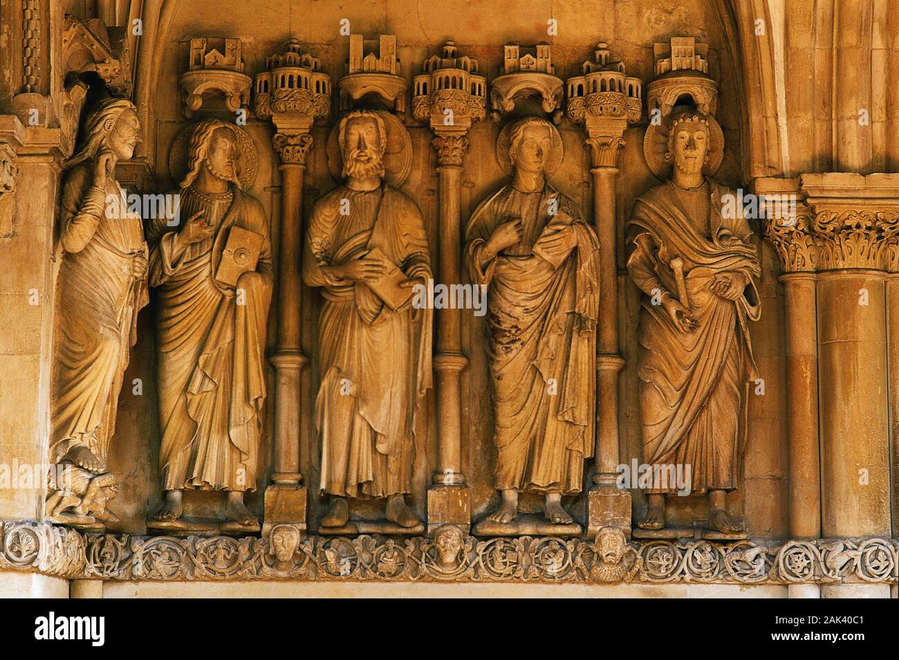 Medieval relief of the ten apostles in the paradise in the vestibule of ...