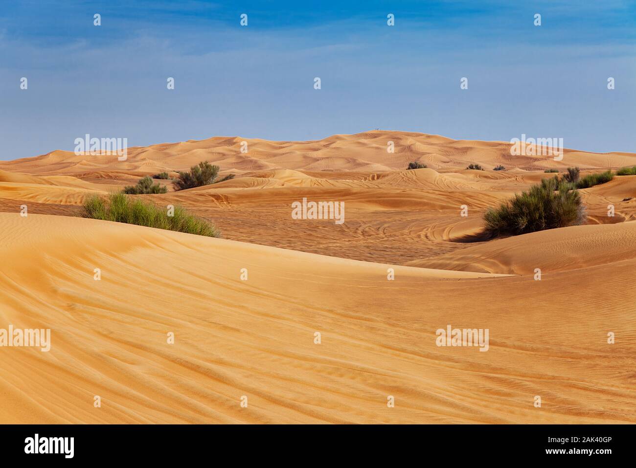 Red Sand Desert Barchan and Blue Sky Lanscape Stock Photo - Alamy