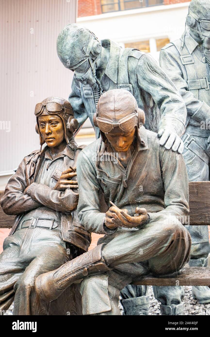 statue of a group of pilots during a mission briefing outside The ...