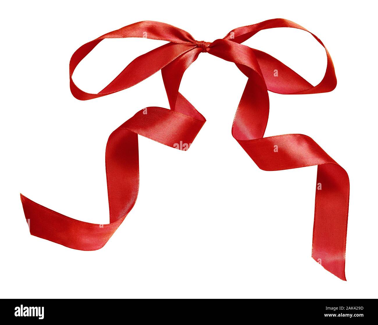 Large red silk ribbon bow isolated on white Stock Photo - Alamy
