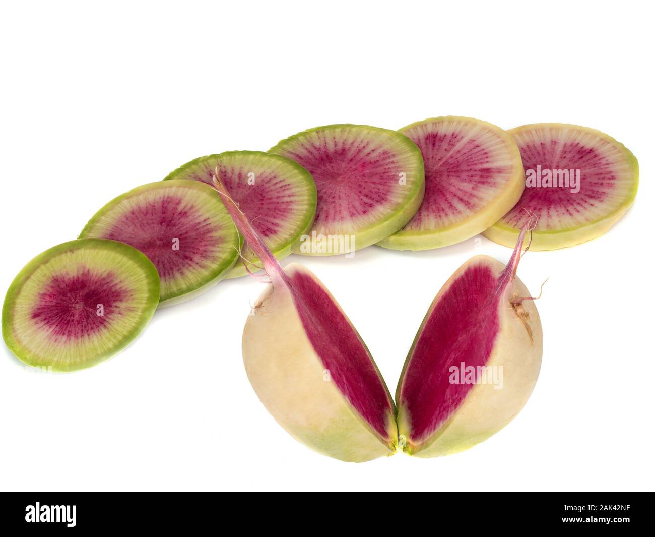 Sliced red radish isolated on white background Stock Photo - Alamy