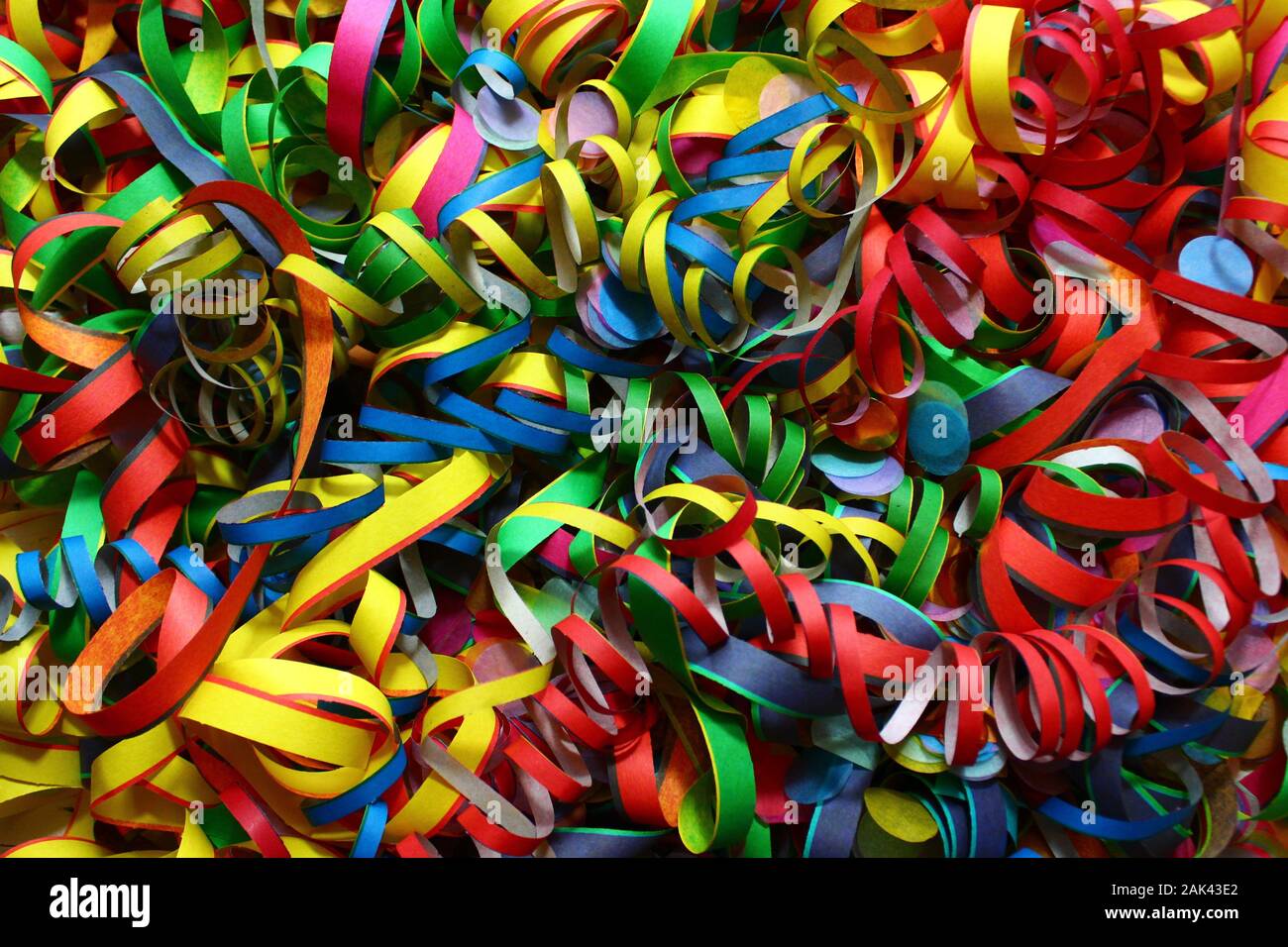 The picture shows paper streamers and confetti Stock Photo - Alamy
