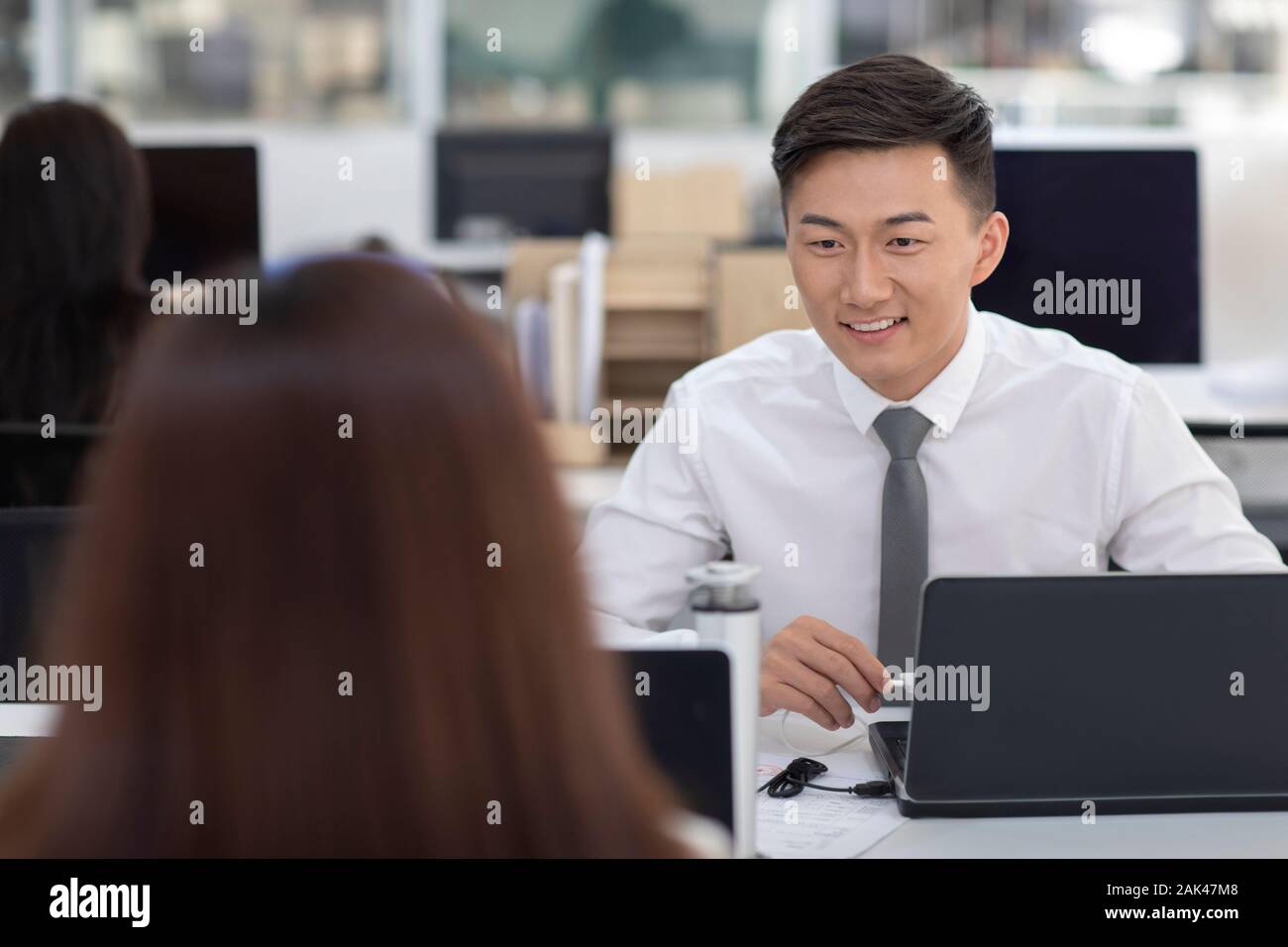 Chinese business people working in office Stock Photo - Alamy