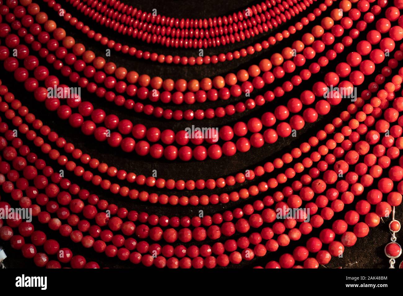 Coral necklage earrings jewelry on display stand in a shop market Stock ...