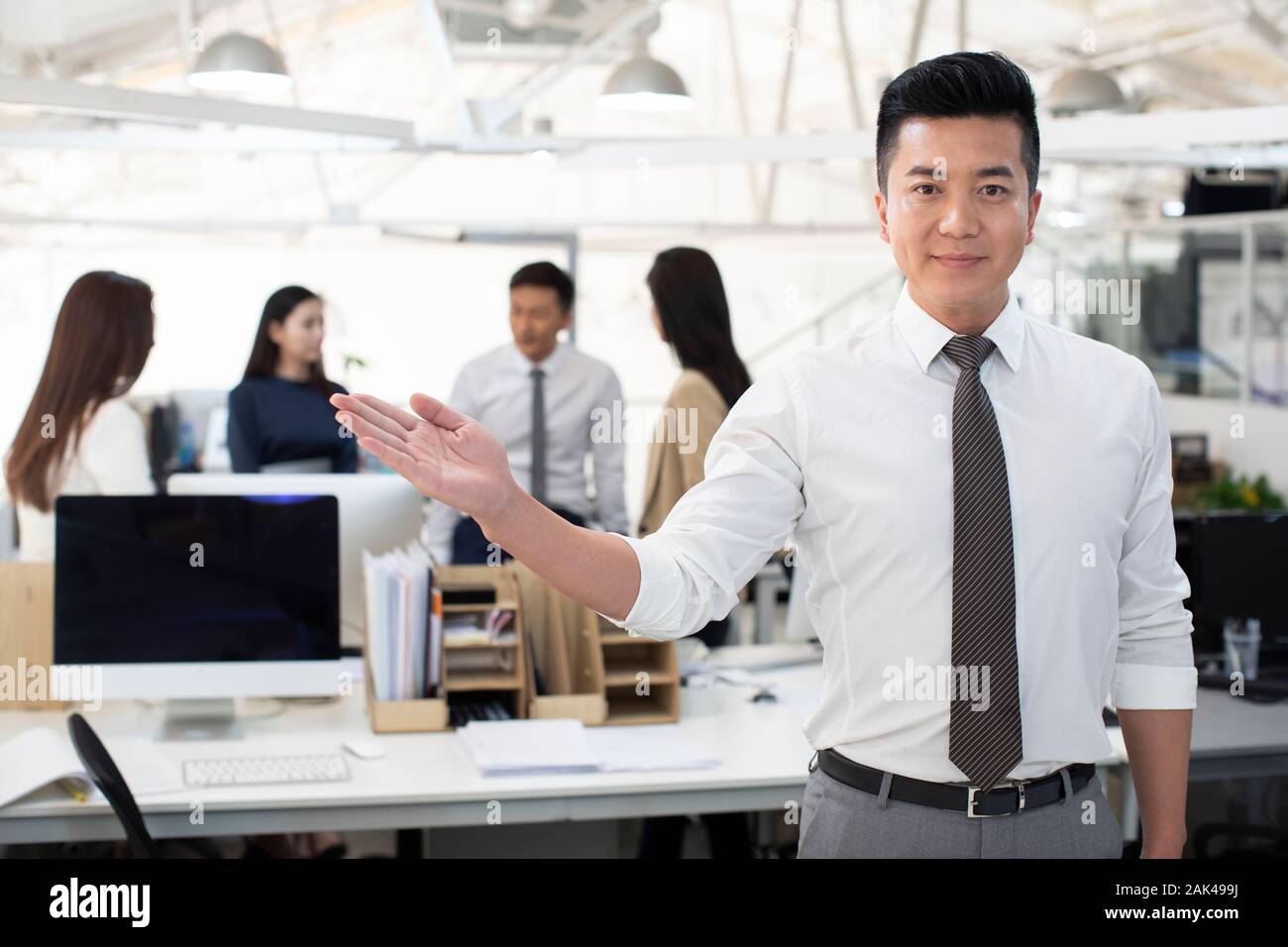 Chinese business people working in office Stock Photo - Alamy