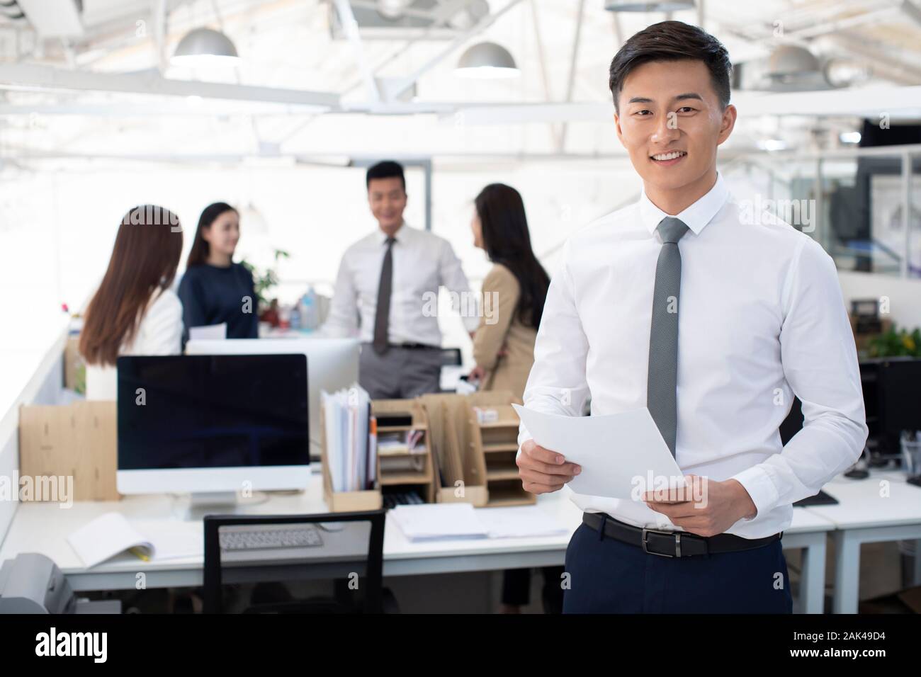 Chinese business people working in office Stock Photo - Alamy
