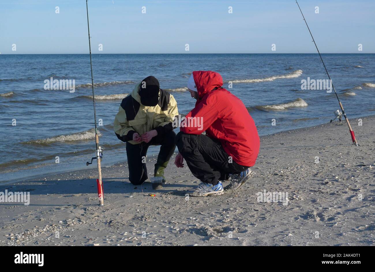 Angler at seashore Stock Photo - Alamy