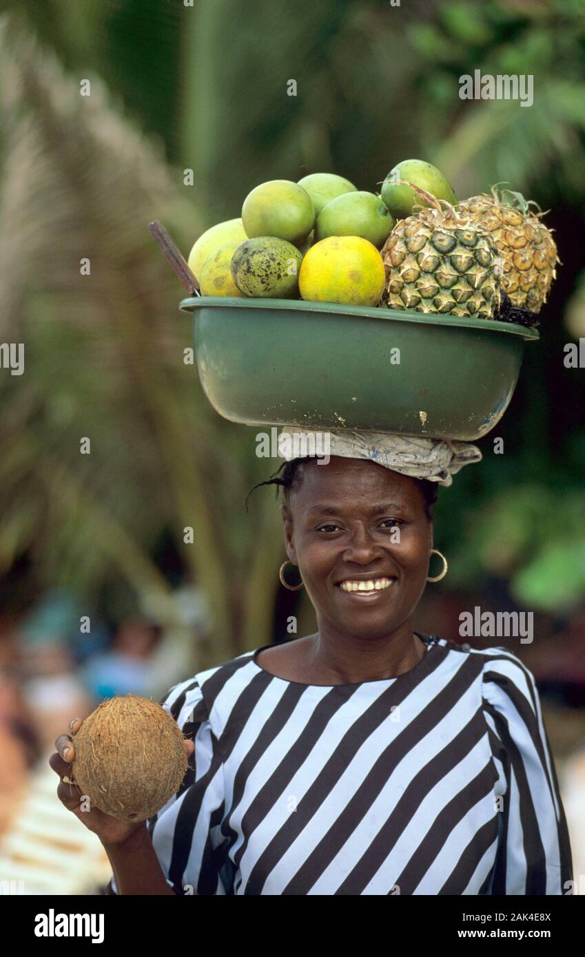 Dominican Republic: Haitian Fruit Seller with Fruits on Sosua Beach ...