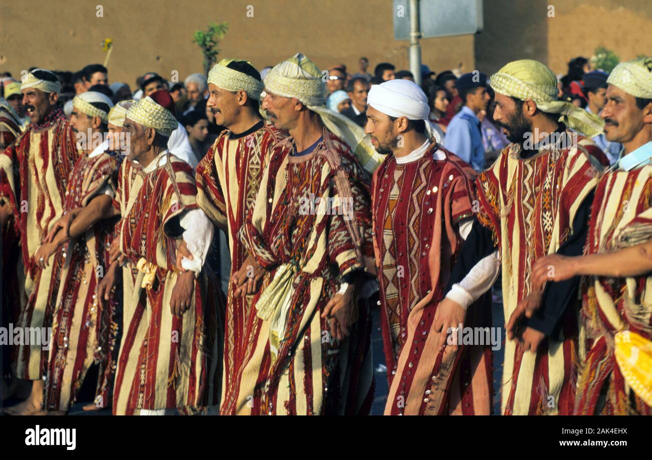 Morocco - men in traditional clothes during a procession in Salé ...