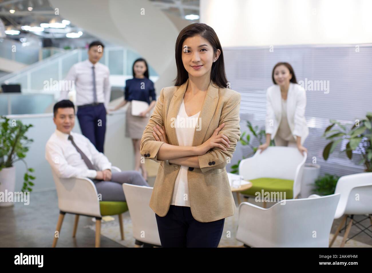 Chinese business people working in office Stock Photo - Alamy