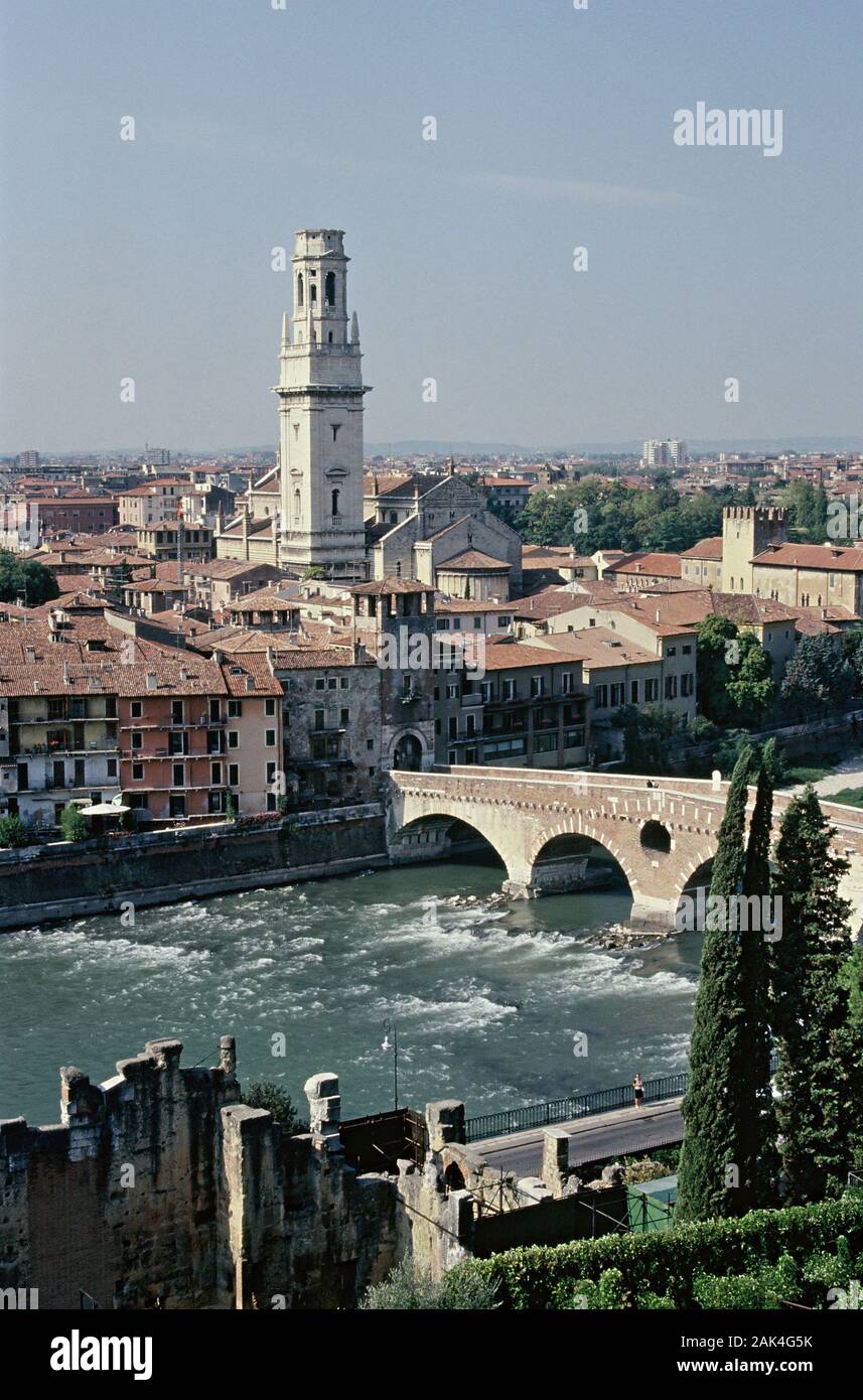 The Roman arch bridge Ponte Pietra leads across the Adige river in ...