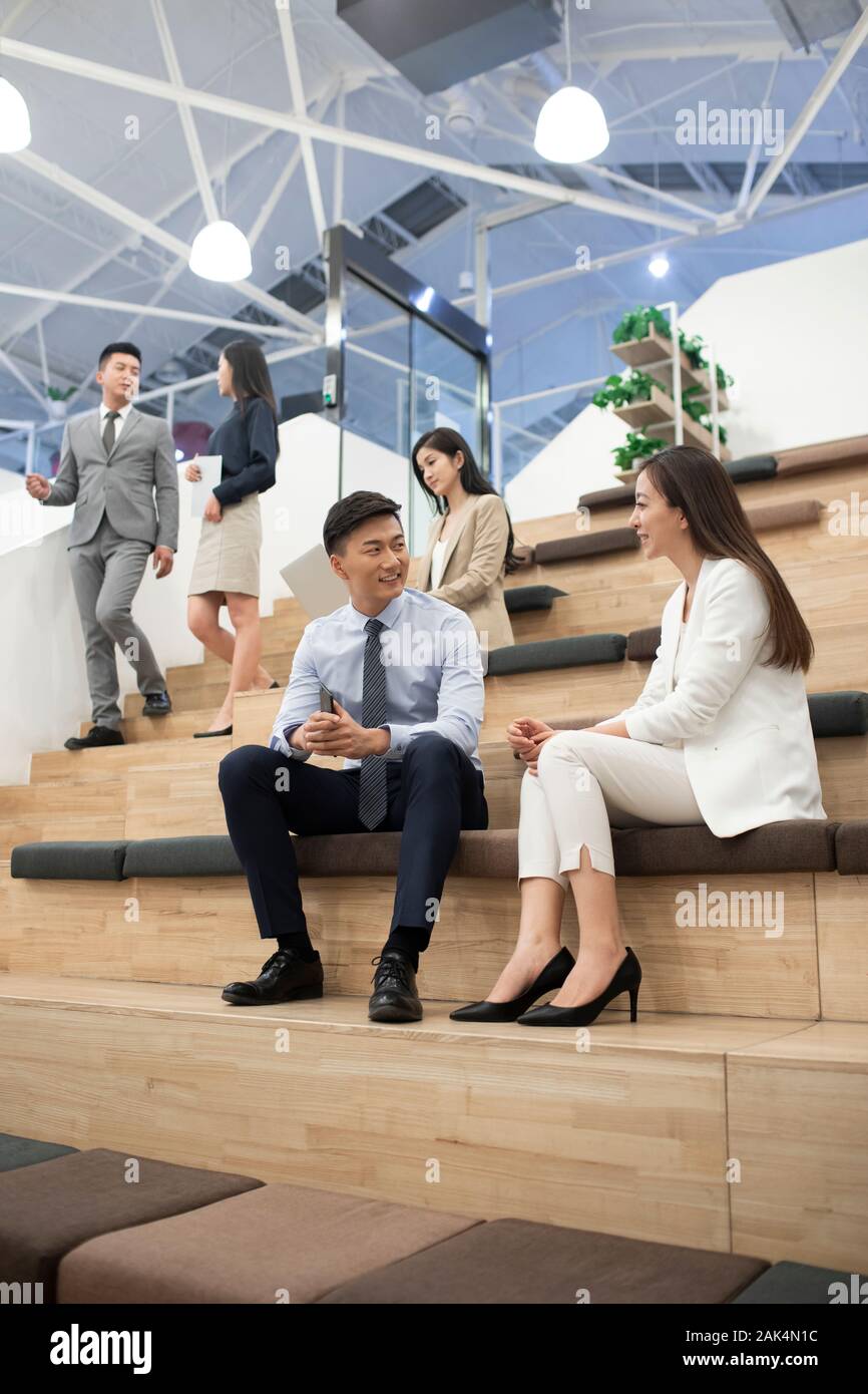 Chinese business people in lecture hall Stock Photo - Alamy