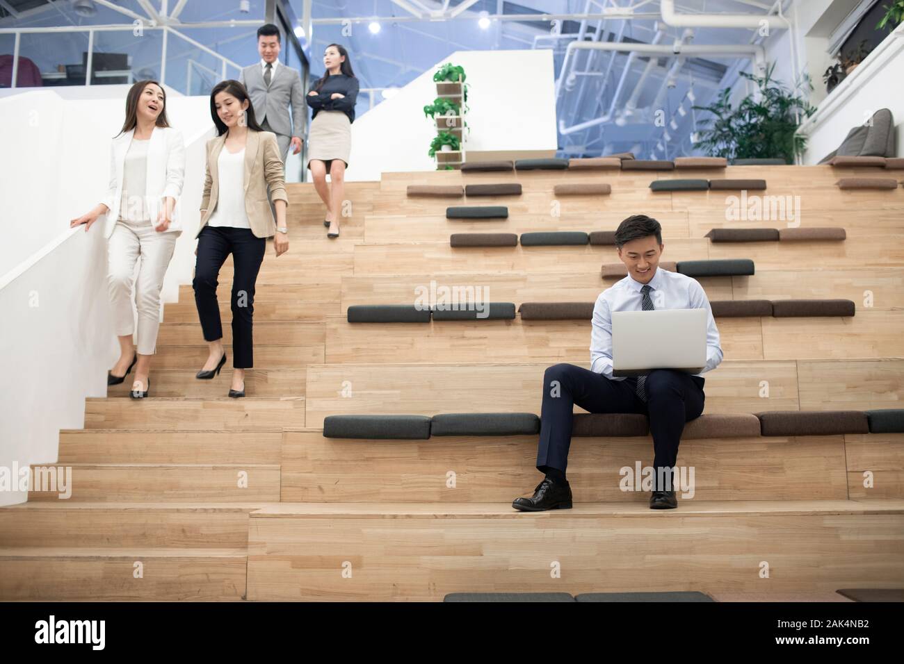Chinese business people in lecture hall Stock Photo - Alamy