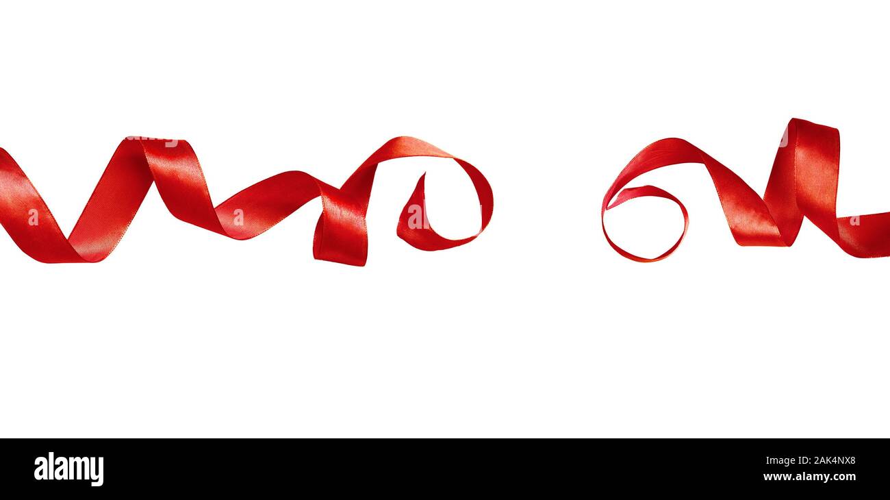 Red silk twisted ribbons isolated on white background Stock Photo - Alamy