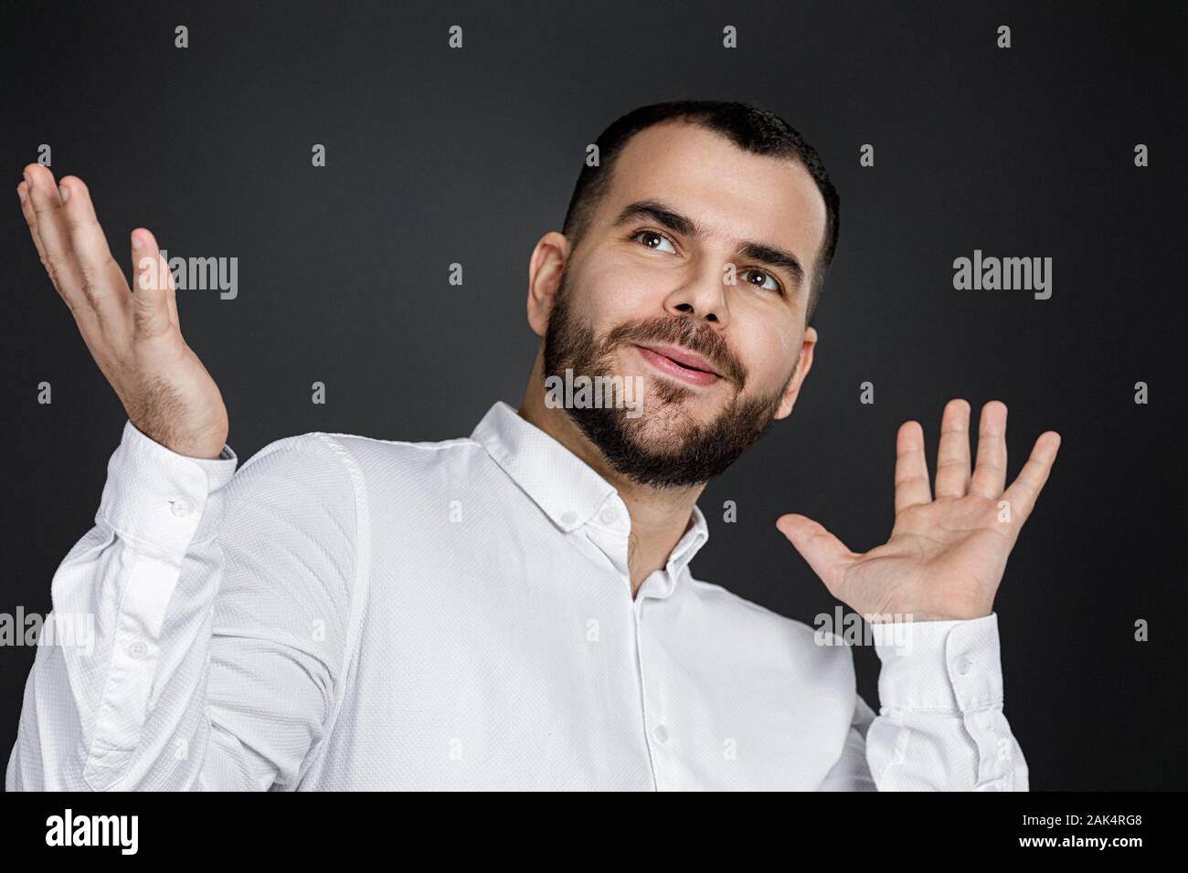 Portrait Of Young Surprised Handsome Bearded Man With Shocked Facial
