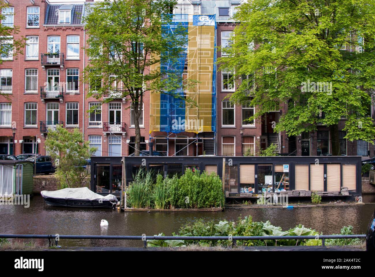 Many buildings facing the river Stock Photo - Alamy