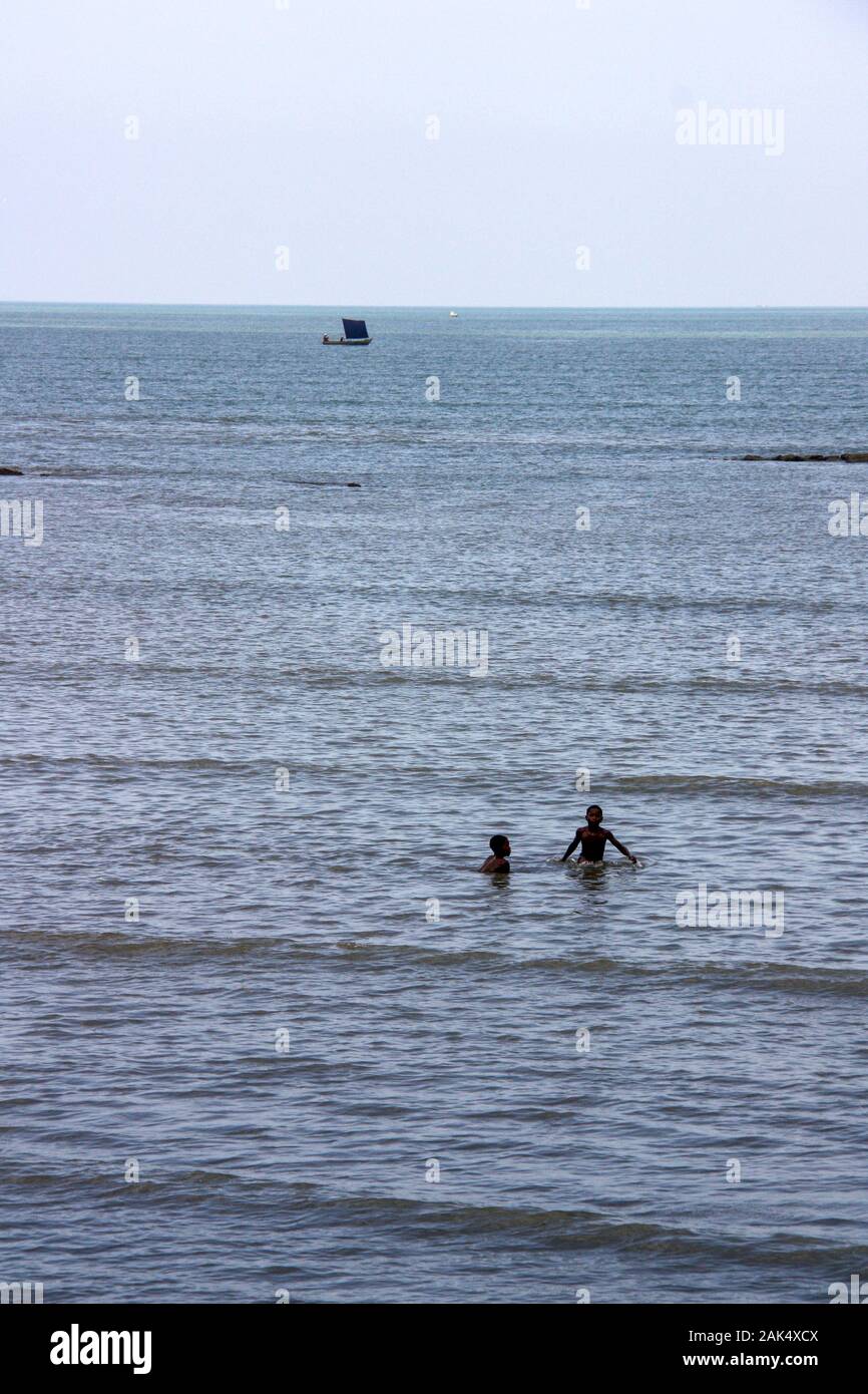Two boys in black sea hi-res stock photography and images - Alamy