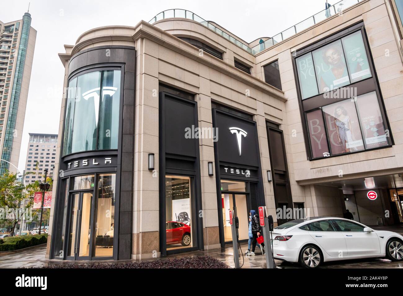 A Tesla Model 3 electric car imported from U.S. is parked at a Tesla ...