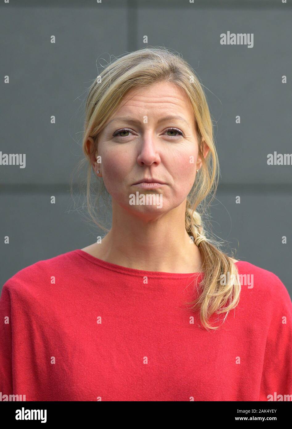 Portrait of a vengeful woman slitting her eyes as she stares at the ...