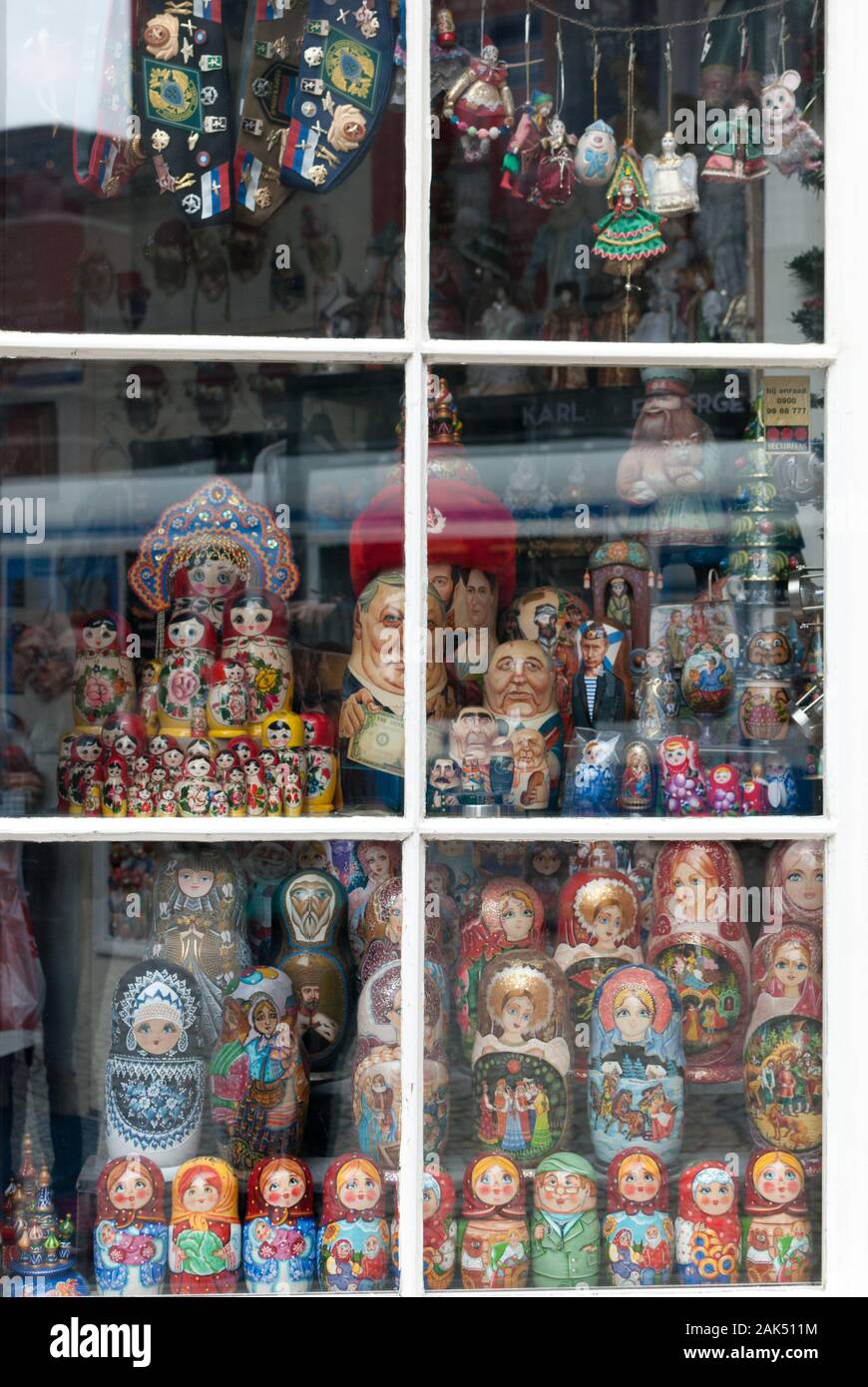 Many russian dolls seen through a window Stock Photo - Alamy