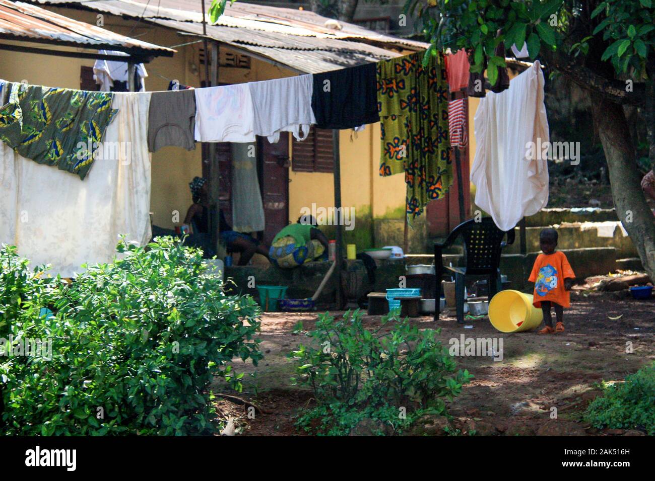 African women washing clothes hi-res stock photography and images - Alamy