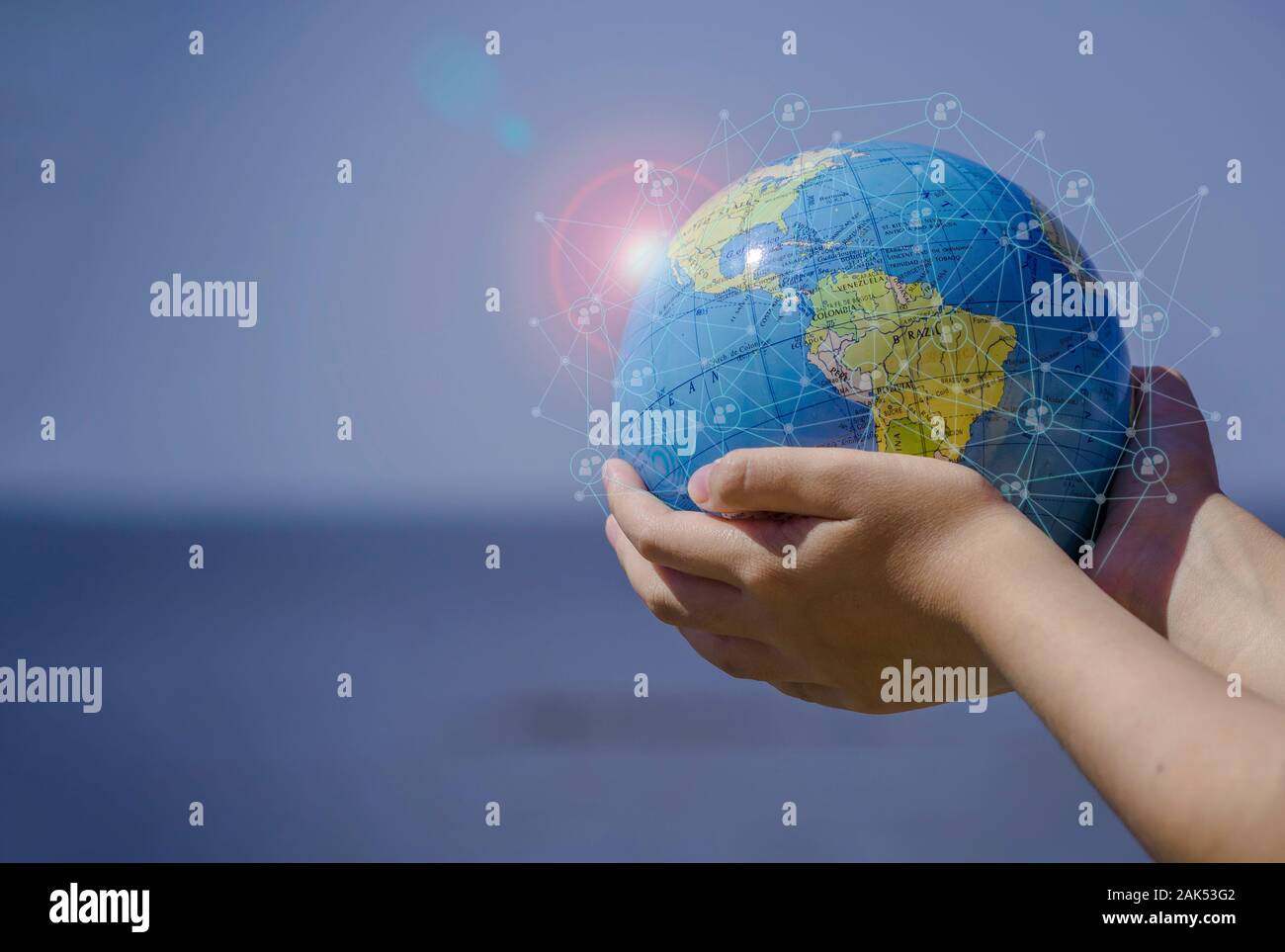 Hands holding global with communication and social network sea ...