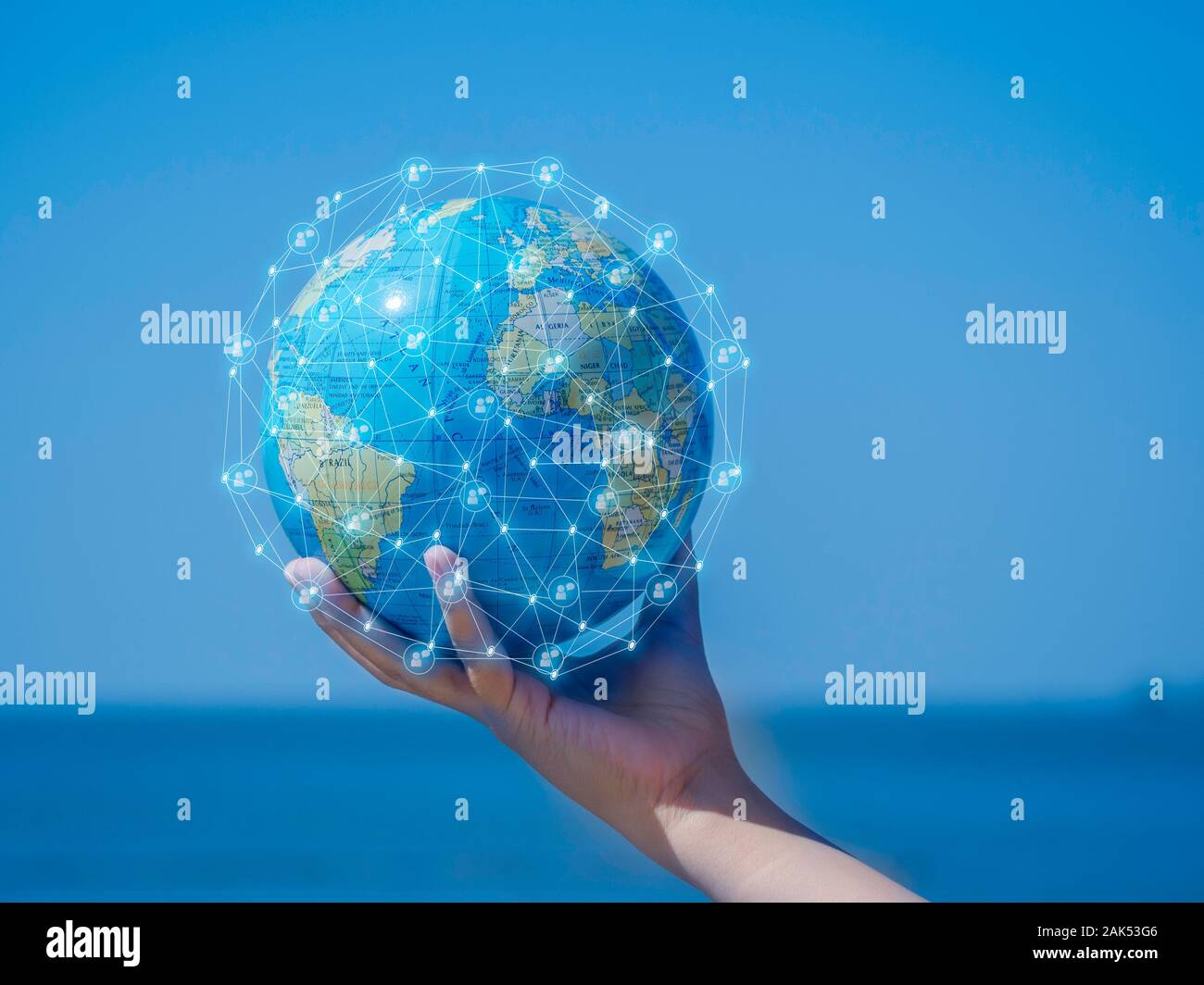 Hands holding global with communication and social network sea ...