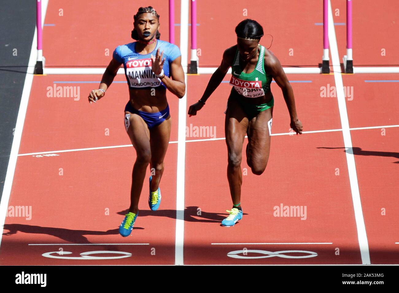 Christina Clemons (USA) and Tobi Amusan (Nigeria) during the 5th Heats ...