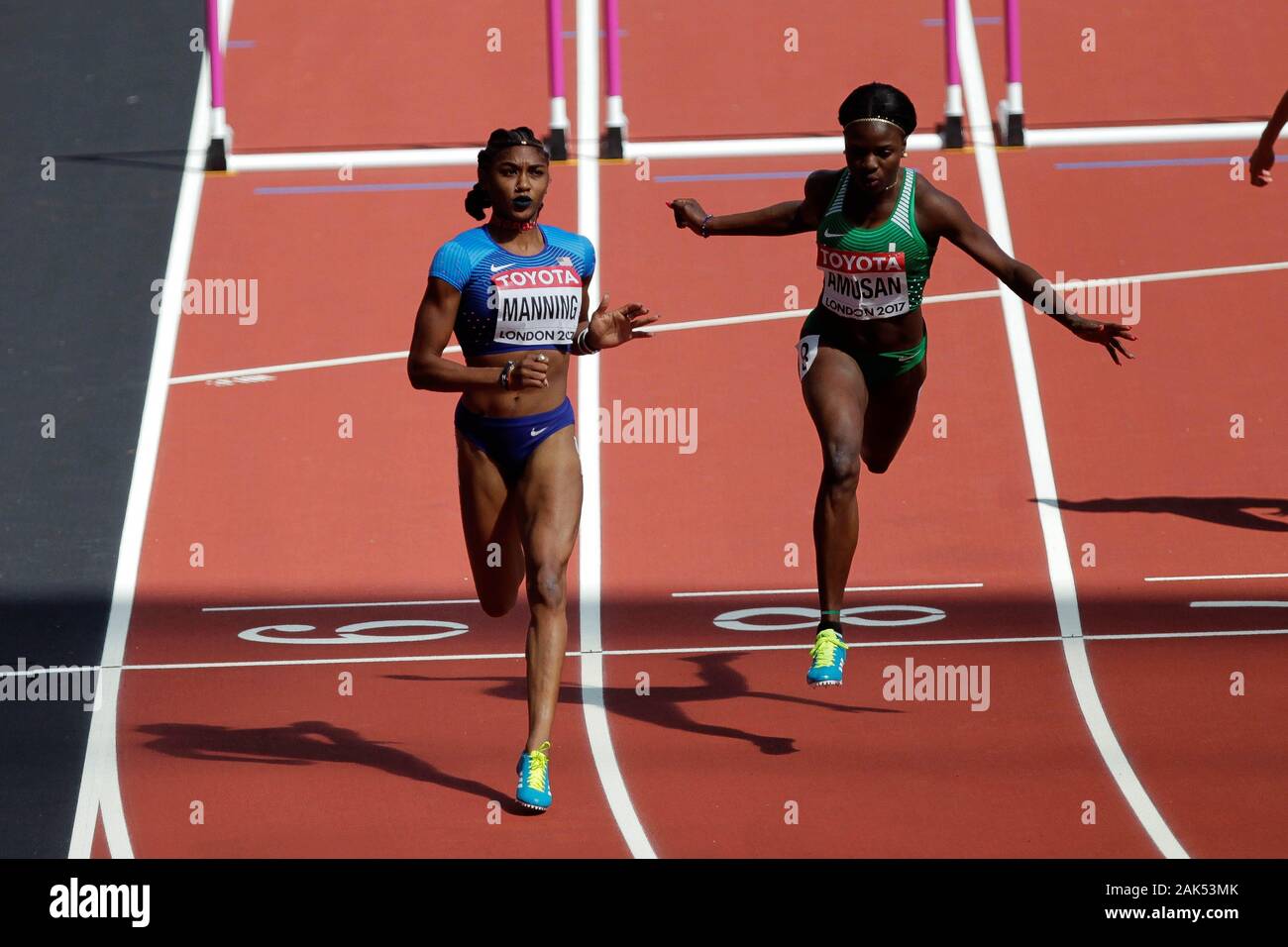 Christina Clemons (USA) and Tobi Amusan (Nigeria) during the 5th Heats ...