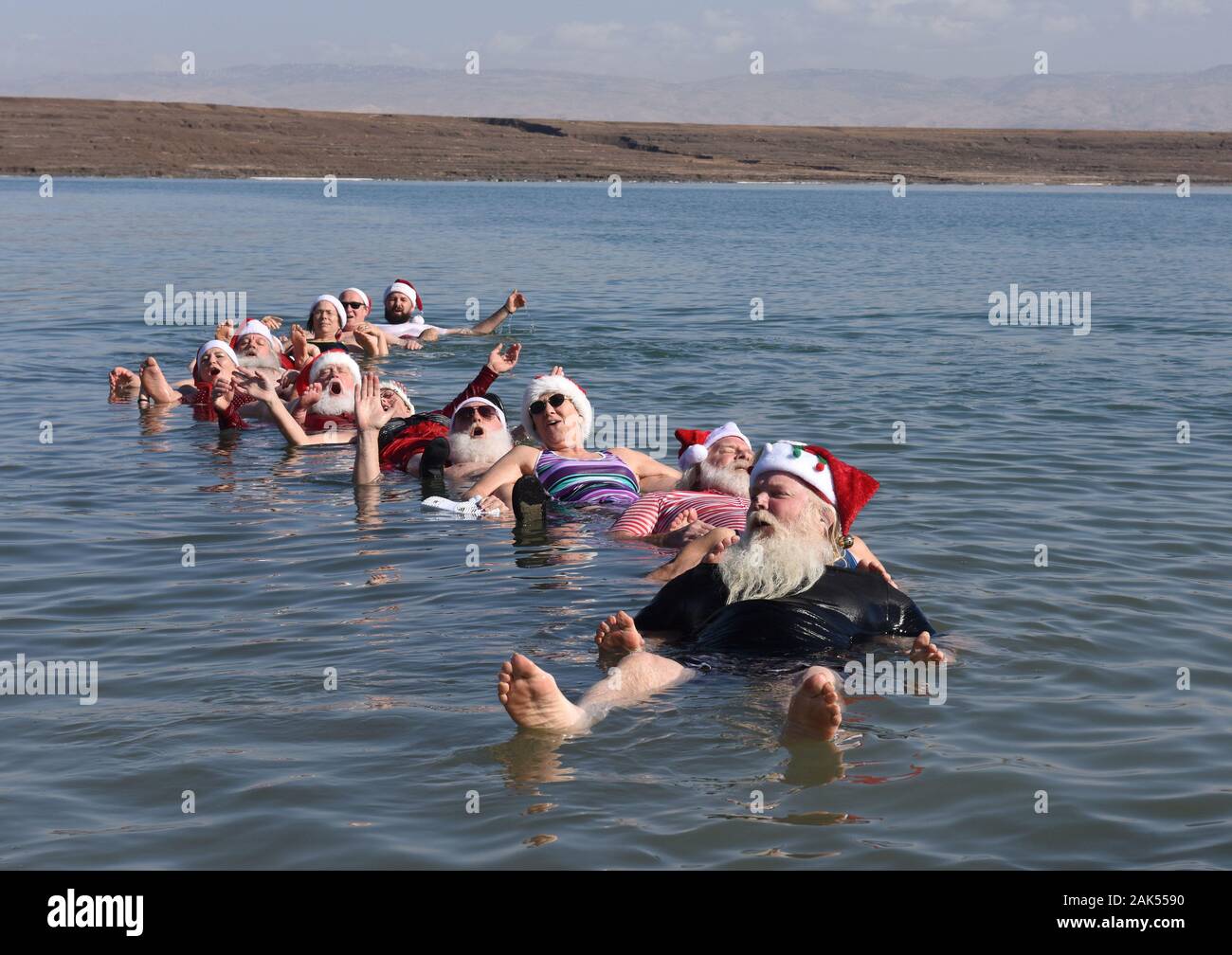 Women dressed as santa hi-res stock photography and images - Alamy