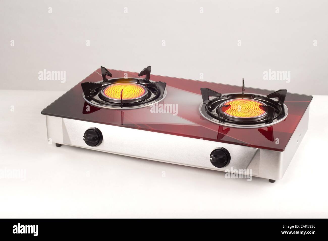 kitchen gas stove with burning burners isolated on white background ...