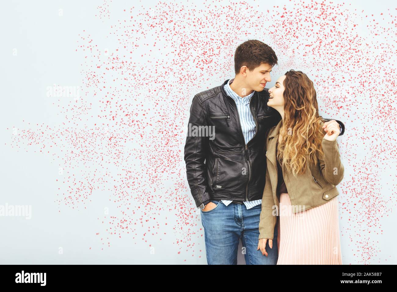 Happy loving couple isolated on gray background. stylish image, good ...