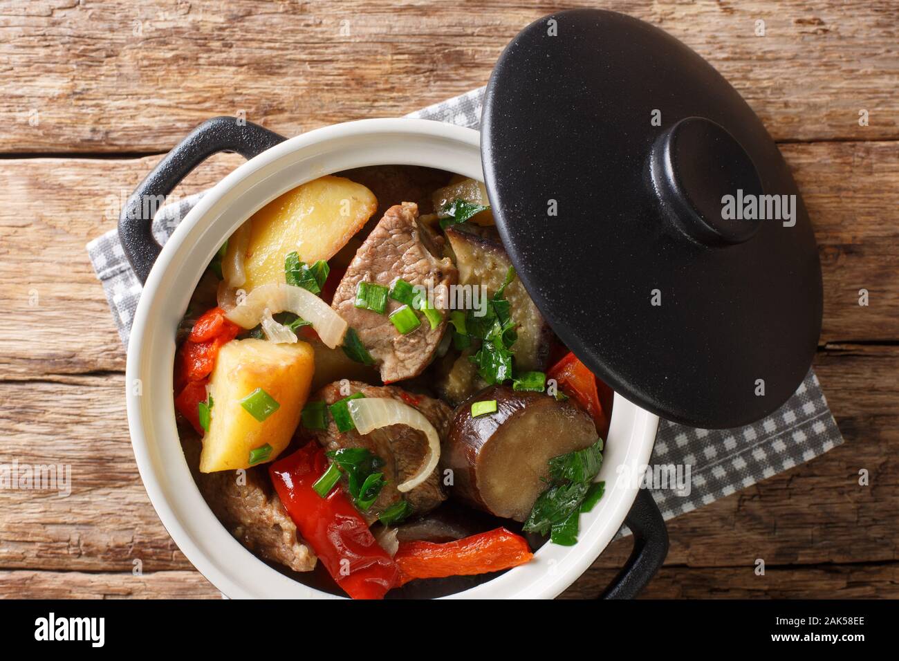 National Georgian food Chanakhi in a pot close-up on the table ...