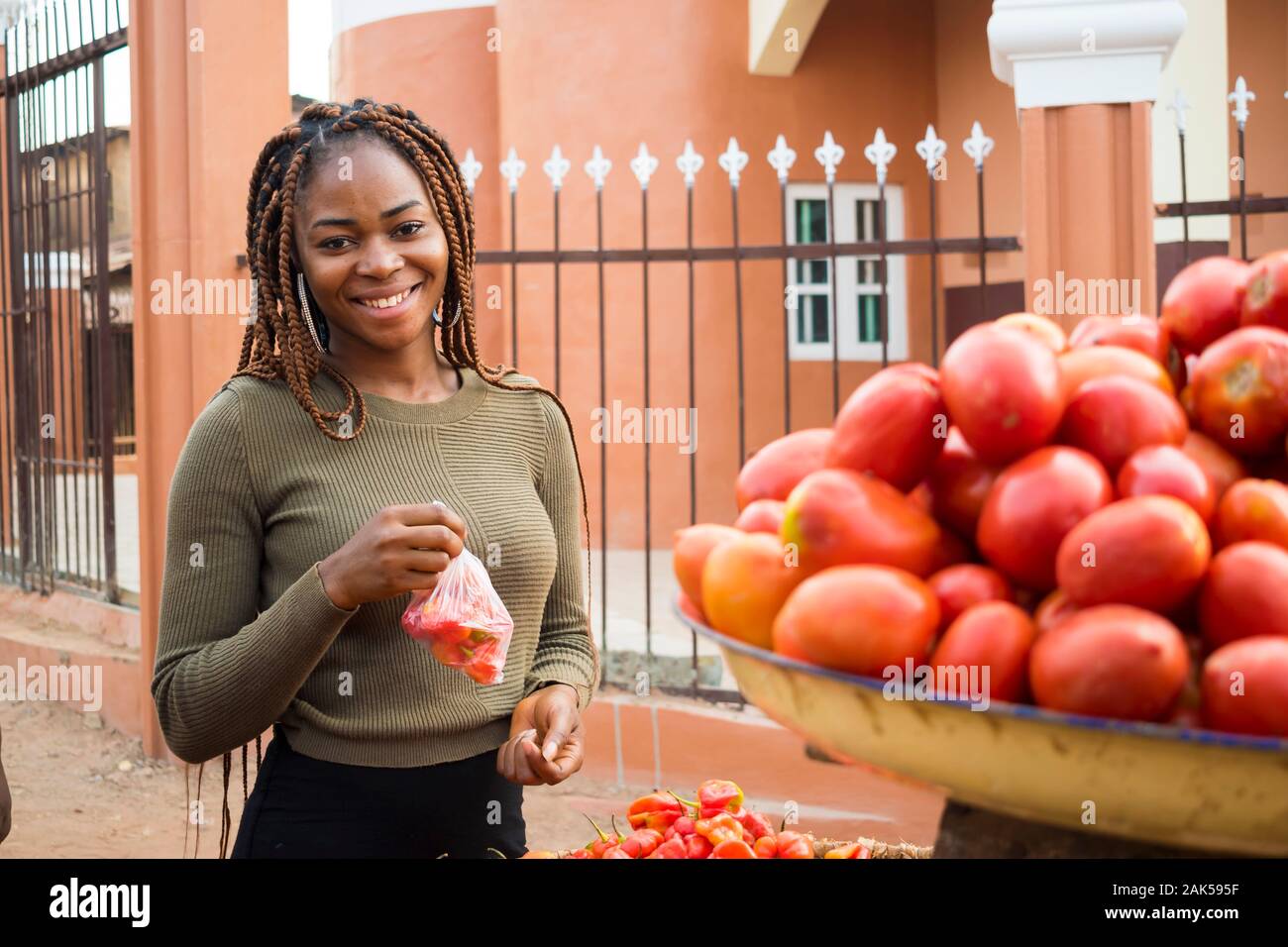 Girl selling food items hi-res stock photography and images - Alamy