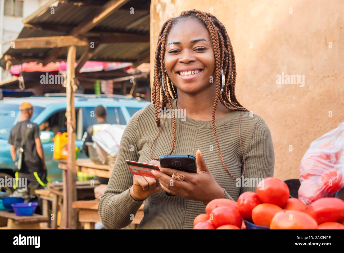 Mobile banking in africa hi-res stock photography and images - Alamy