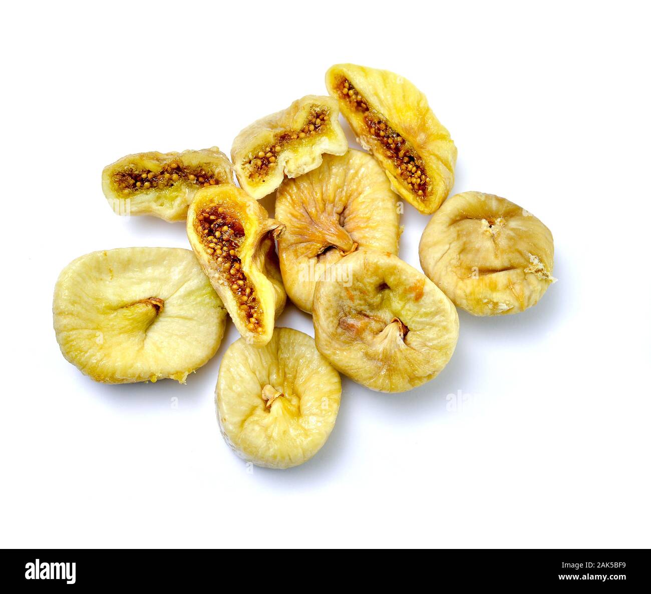 dry fig fruits on a white background image Stock Photo - Alamy