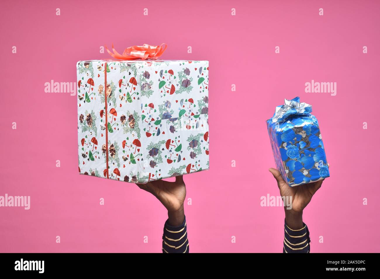 hands lifting up some gift boxes, black people hands only Stock Photo ...