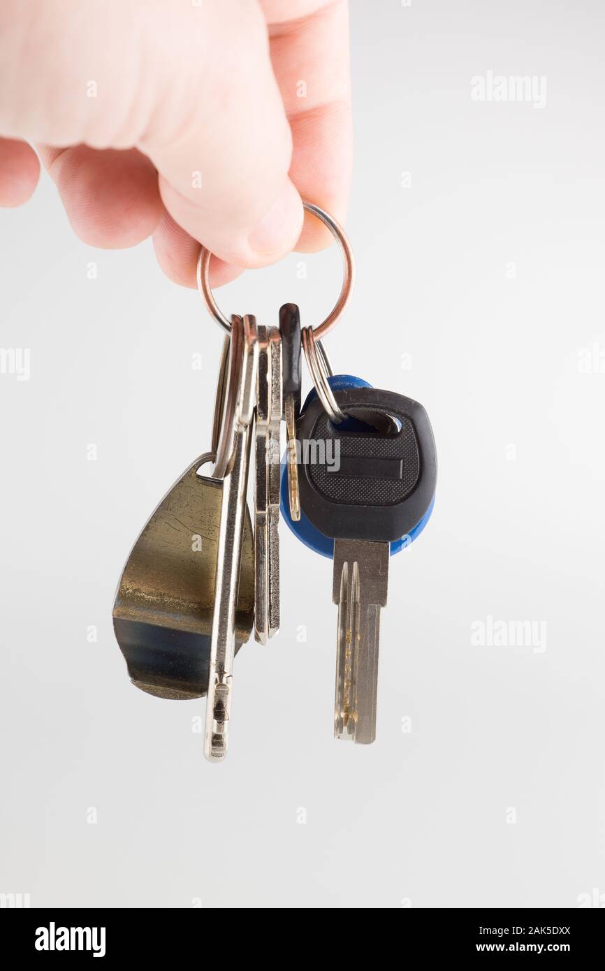 ring of bound keys to a door lock isolated on a white background Stock ...