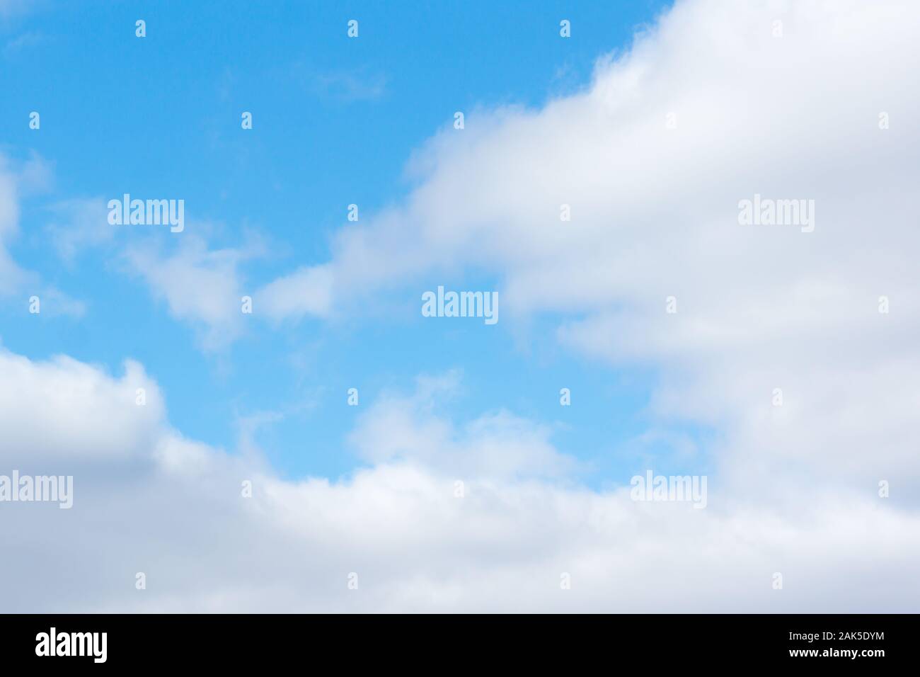 blue sky with flying white light clouds Stock Photo - Alamy