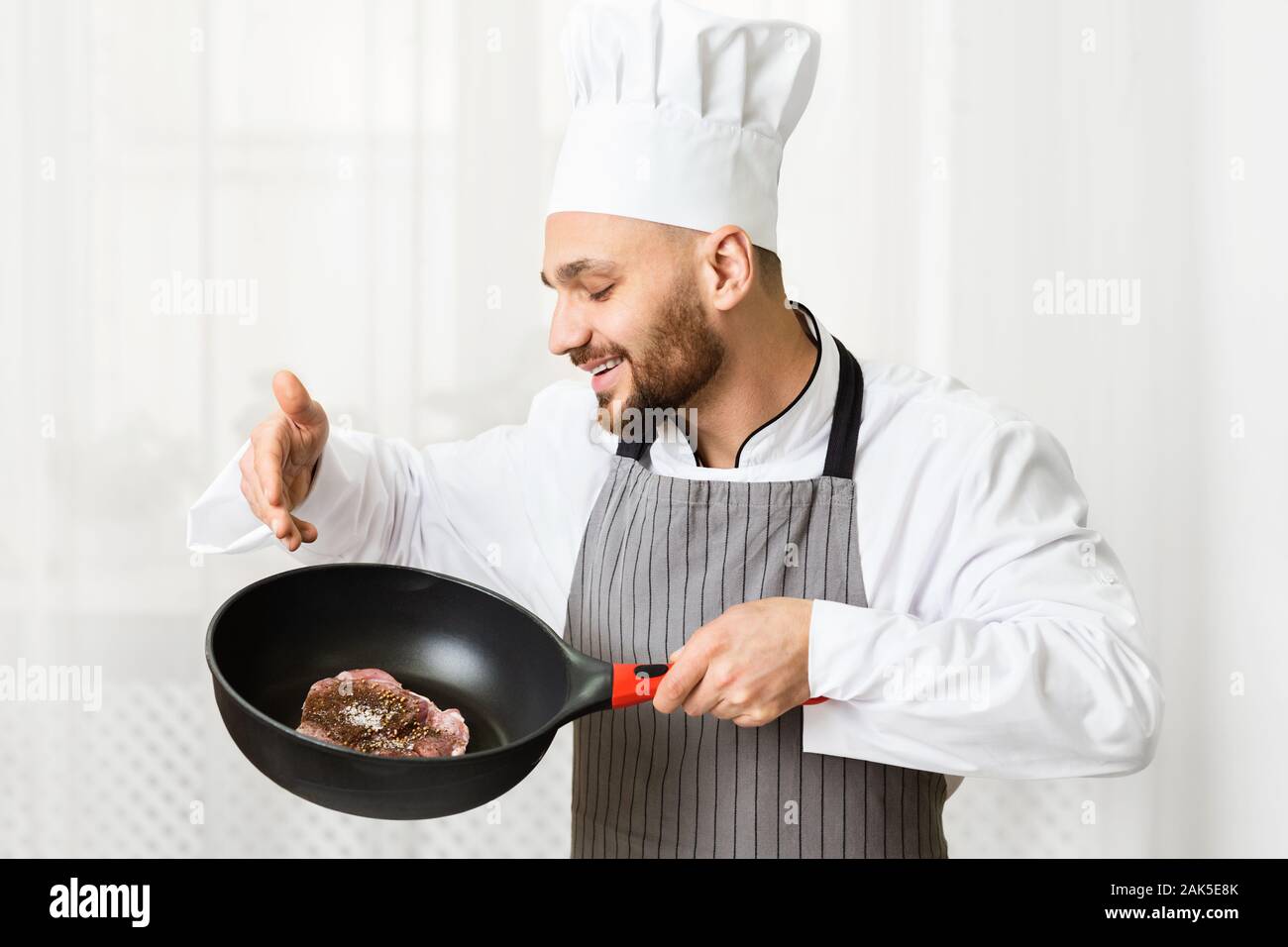 Cooking Meat. Chef Man Holding Pan With Fresh Roast Beef Steak Standing ...