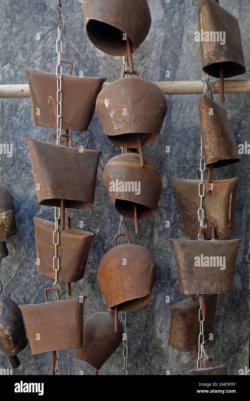 Rusty cowbells of various sizes. Vintage bells for farm animals Stock ...