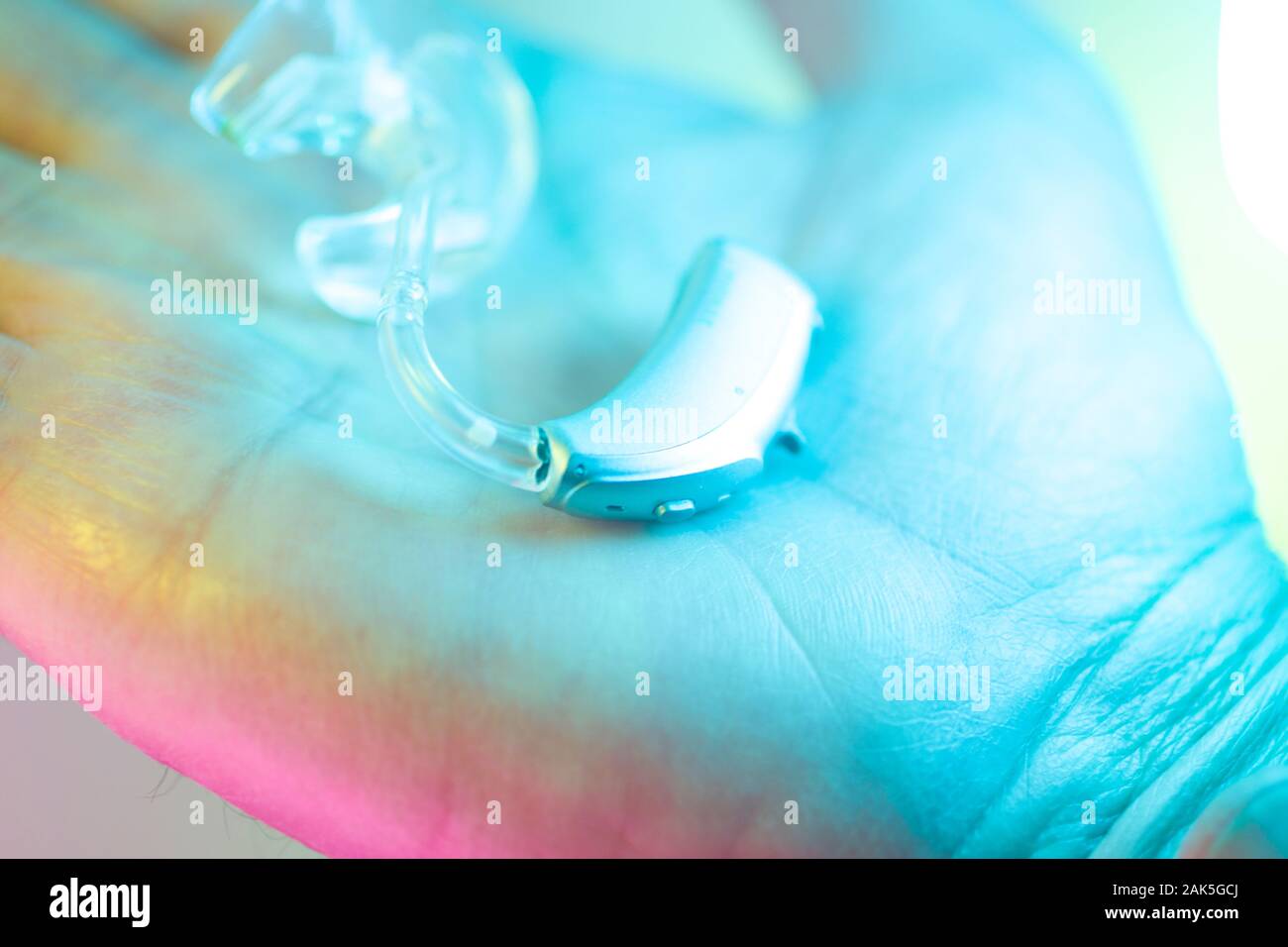 Modern digital hearing aid for deafness and deaf people Stock Photo - Alamy