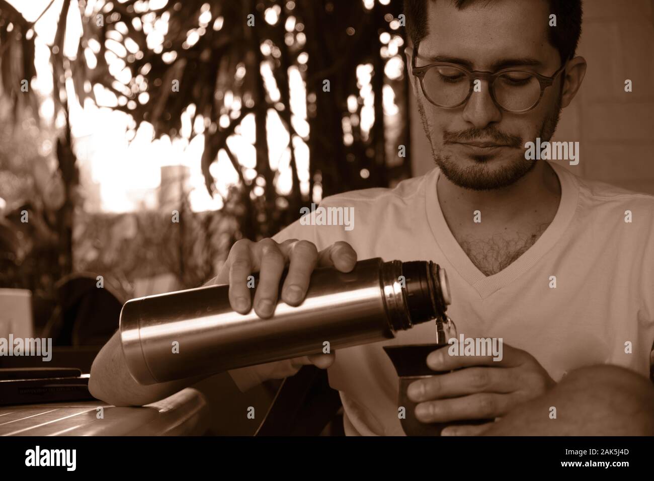 sepia portrait of a men with a concernt expression in his face ...