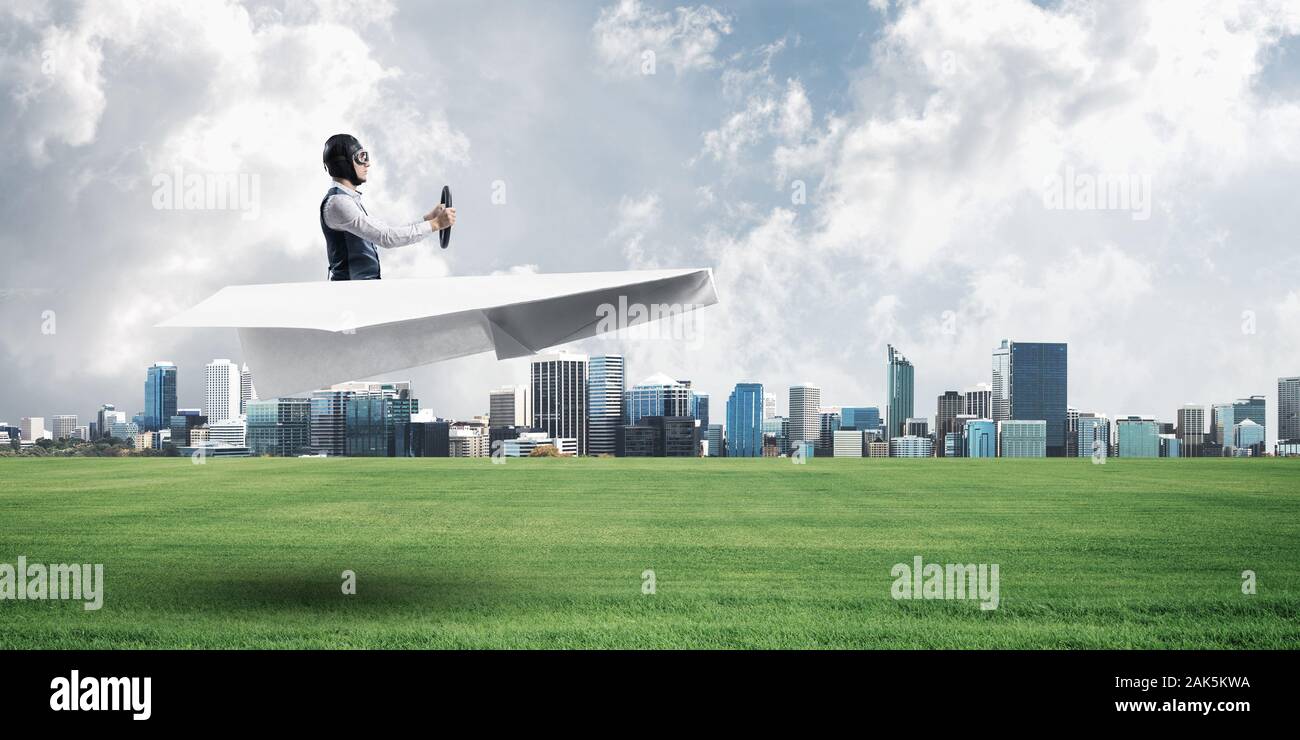 Happy aviator driving paper plane Stock Photo - Alamy