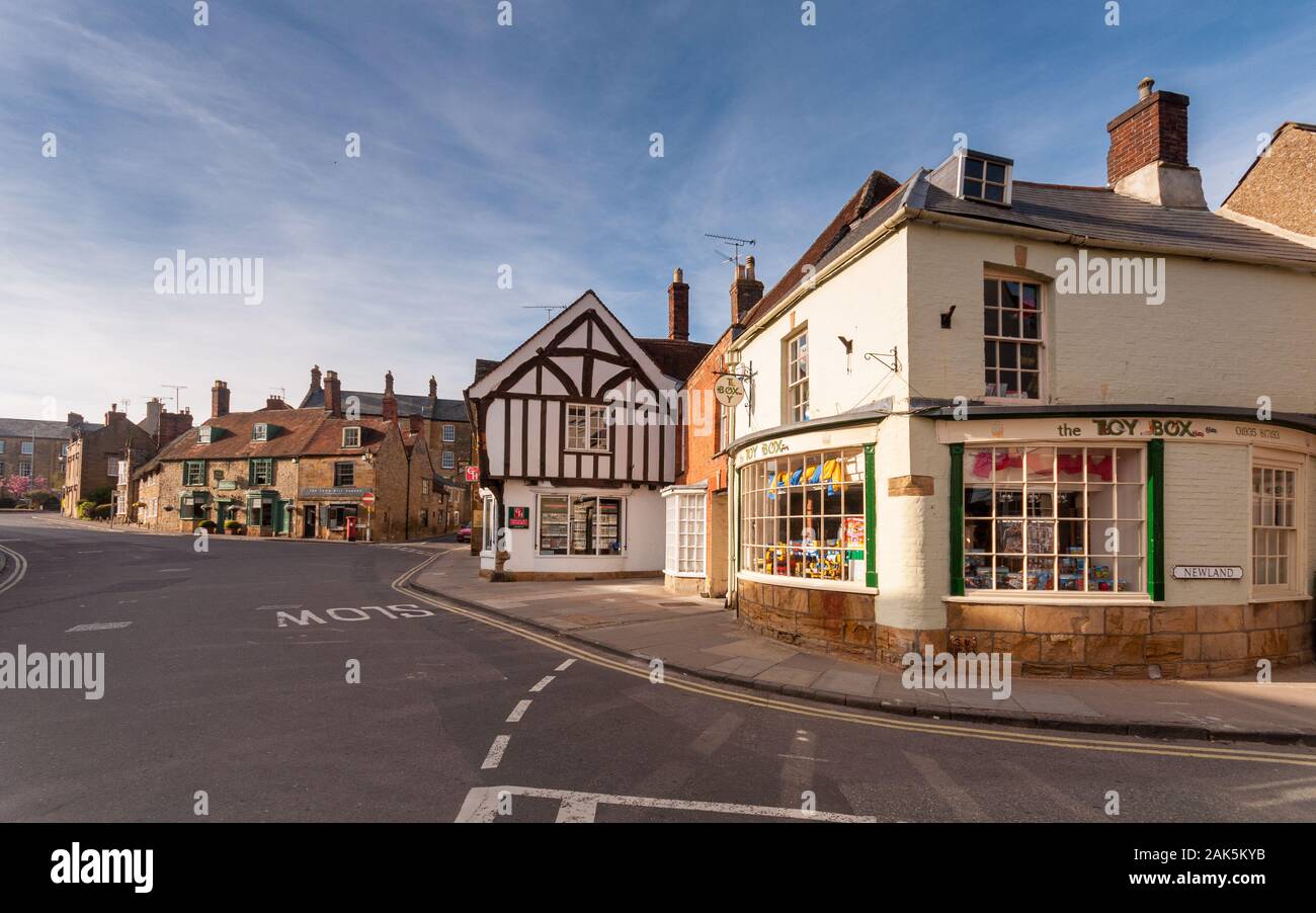 Sherborne, England, UK - April 9, 2011: Traditional shops and houses ...