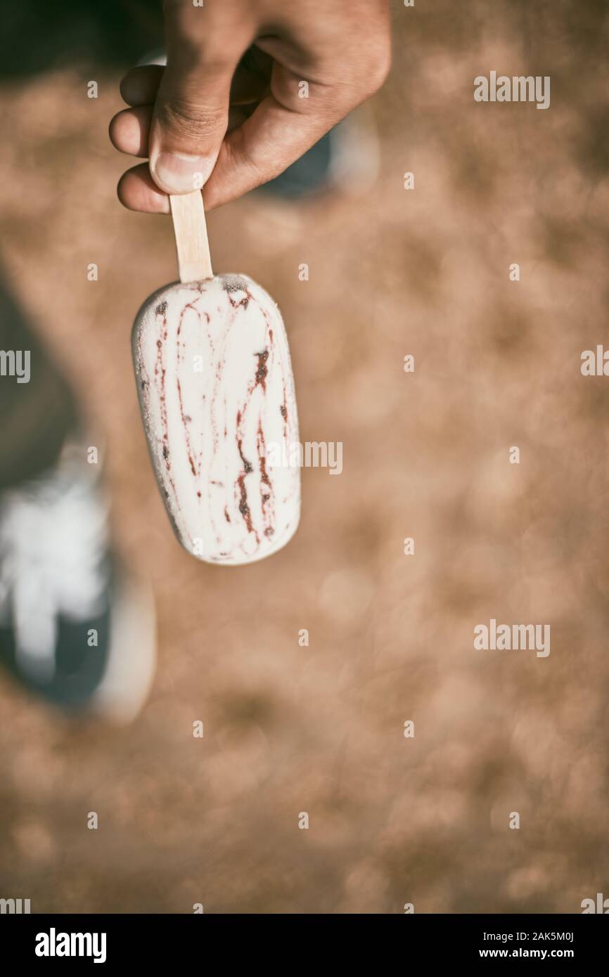 Hand with popsicle hi-res stock photography and images - Alamy