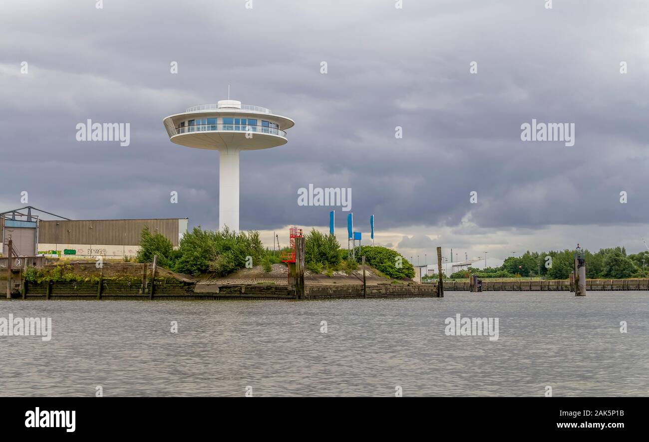 scenery including a watchtower around the Port of Hamburg in Germany ...